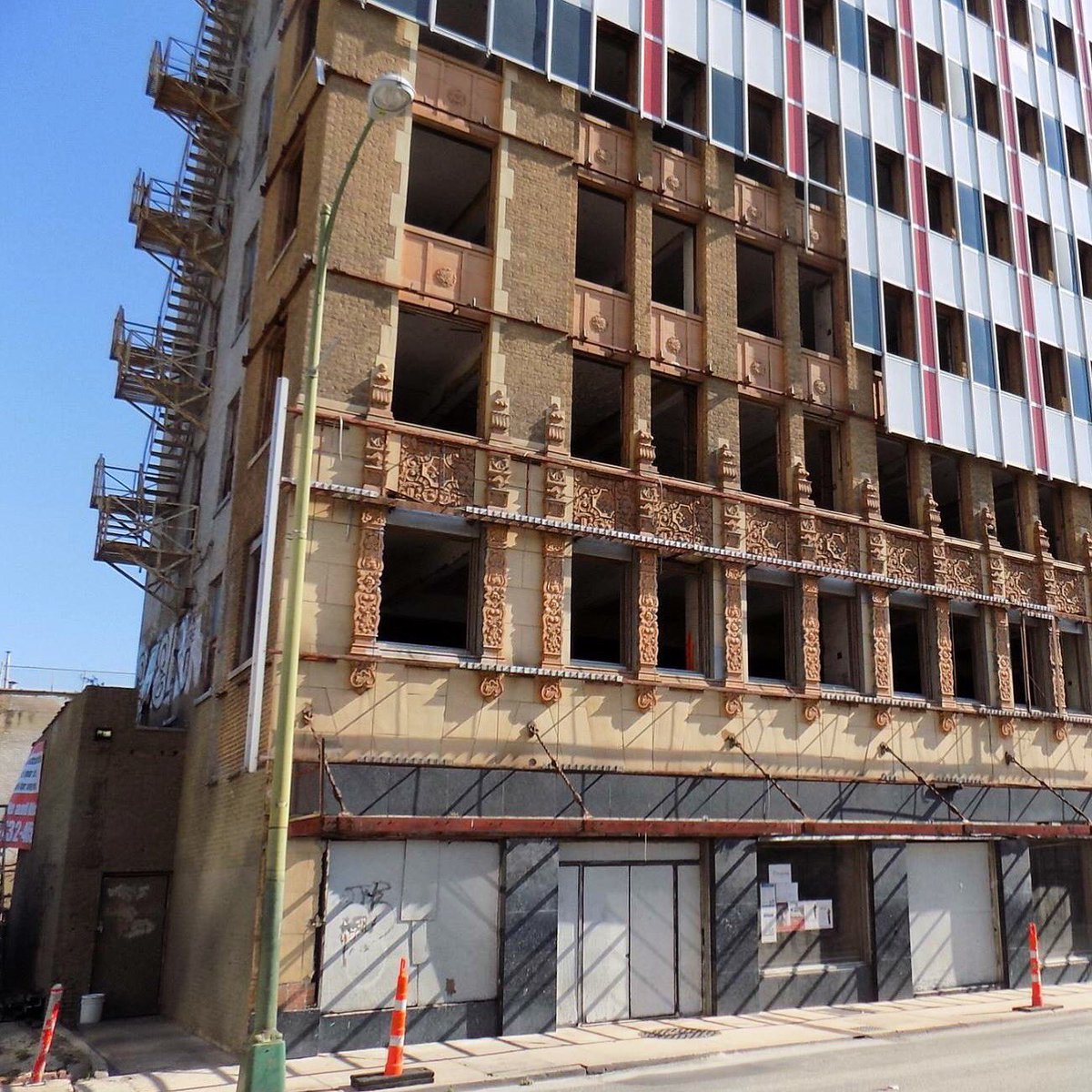 1960s overcladding is removed from a 1920s office building in San Antonio | Scrolller