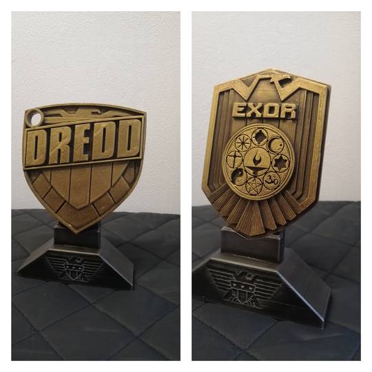 3d printed badges, and badge stand. | Scrolller