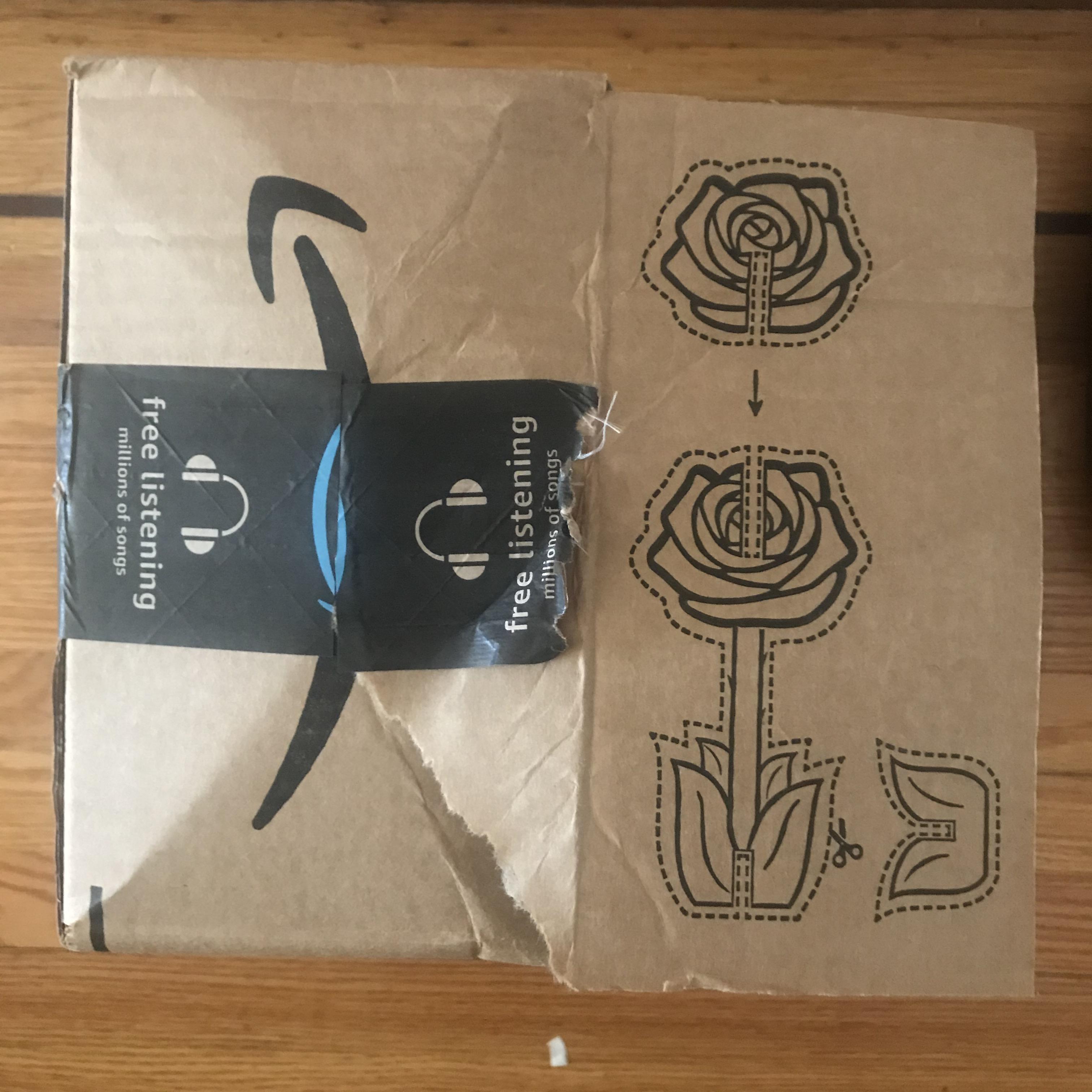 A rose cut out on an Amazon packaging | Scrolller