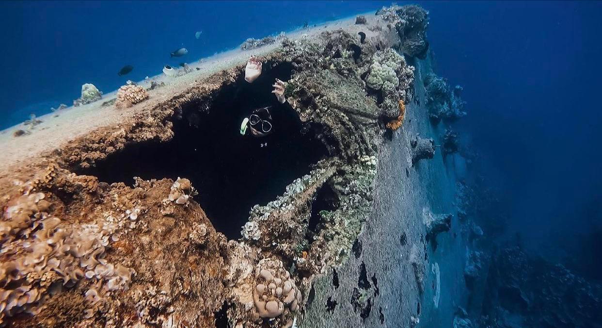 A shipwreck in Guam. This photo isn’t so bad, take a closer look. | Scrolller