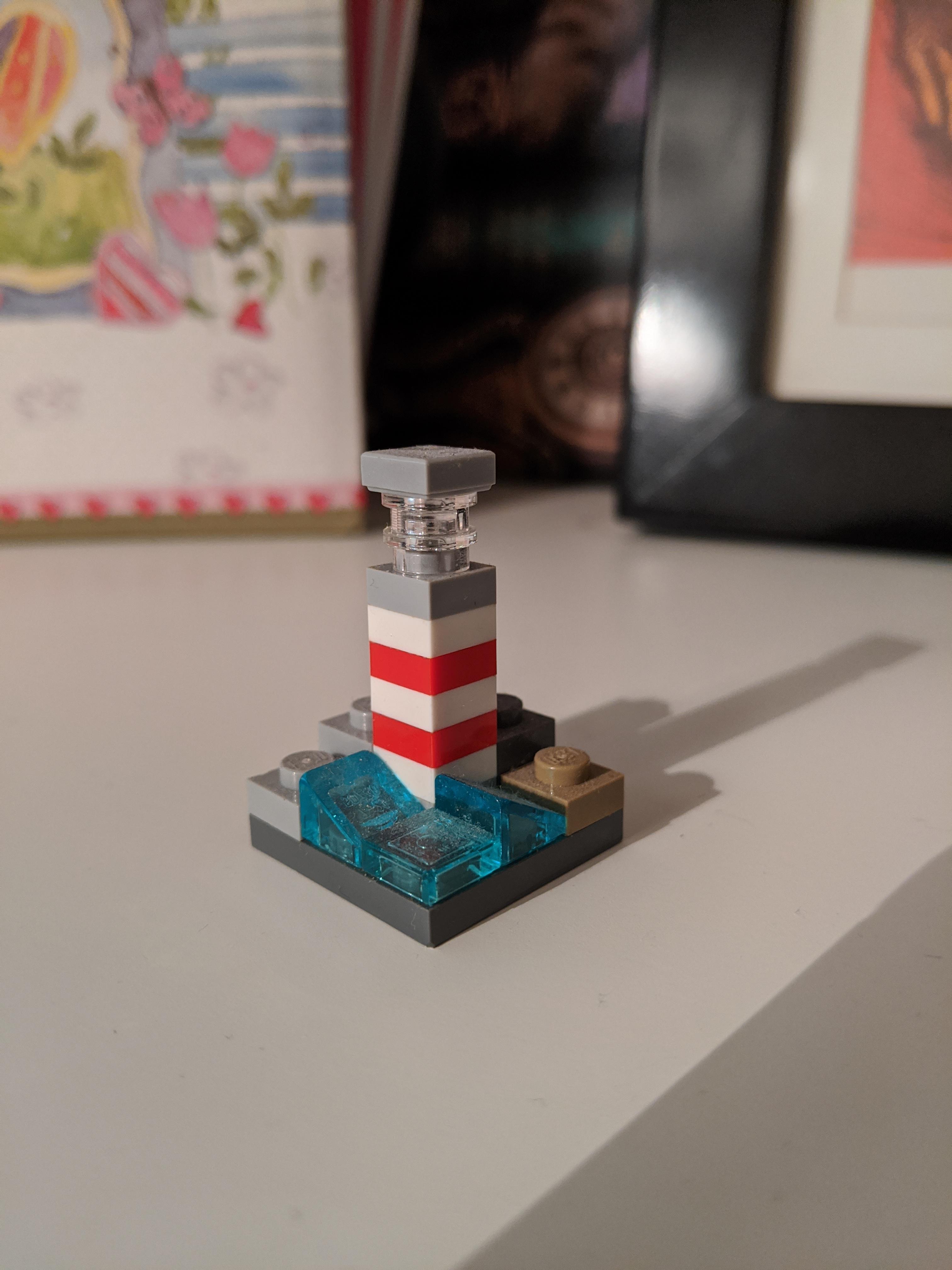 A tiny lighthouse I built with my bowl of leftover parts from various sets | Scrolller