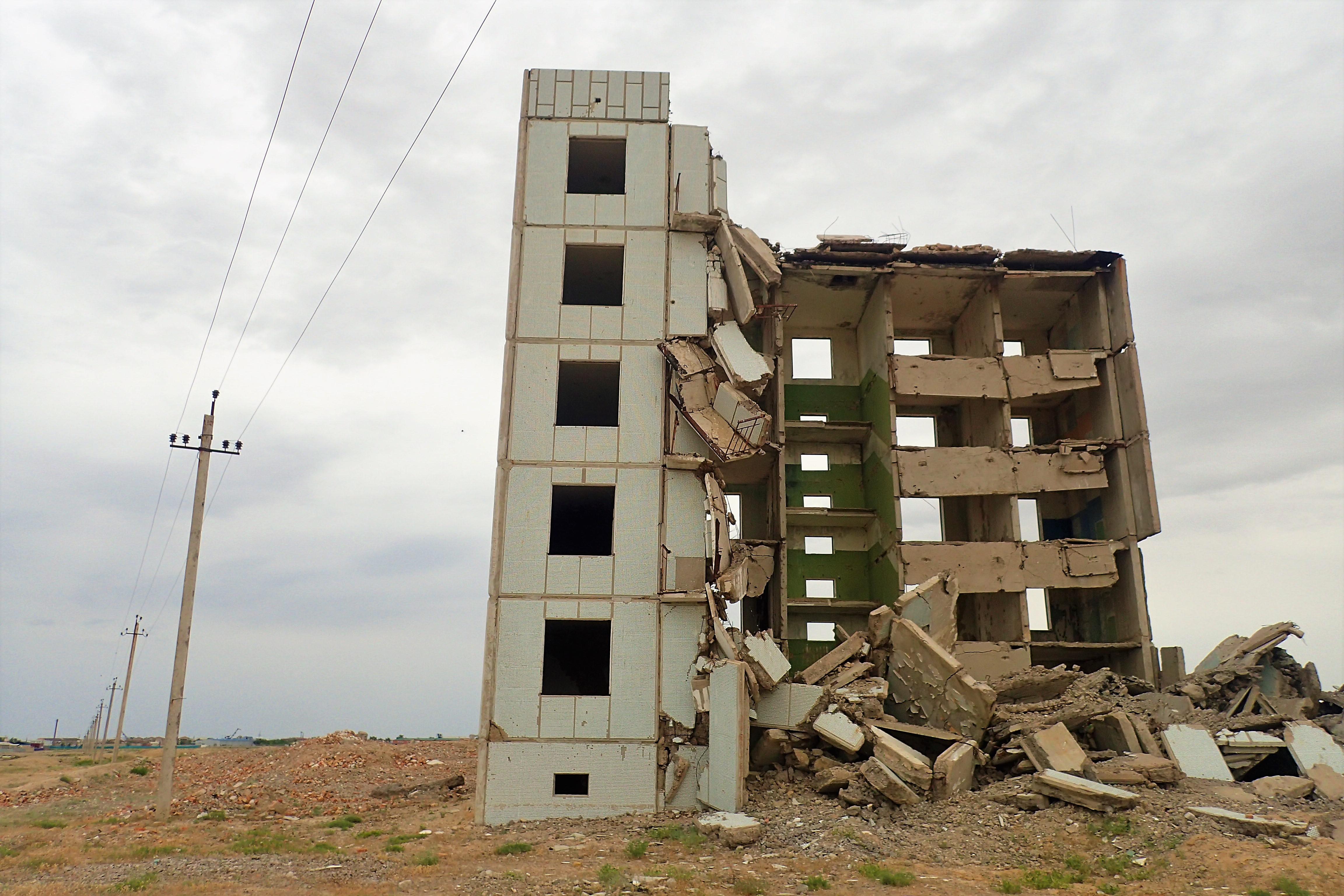 Abandoned and disintegrating buildings beside the Aral Sea, in Aralsk, Kazakhstan | Scrolller