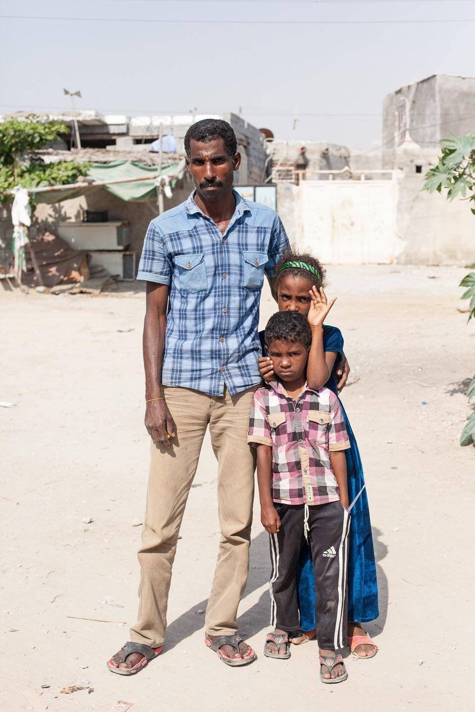 Afro-Iranian man and his children | Scrolller