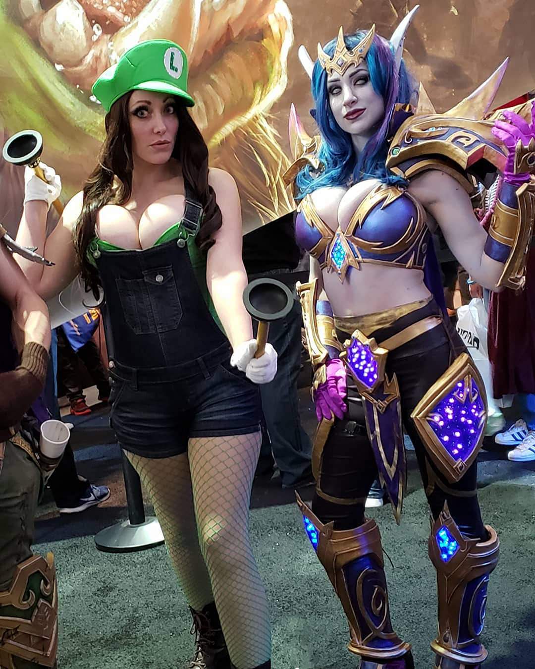 Alina Masquerade as Luigi and Azura Cosplay as a Void Elf | Scrolller