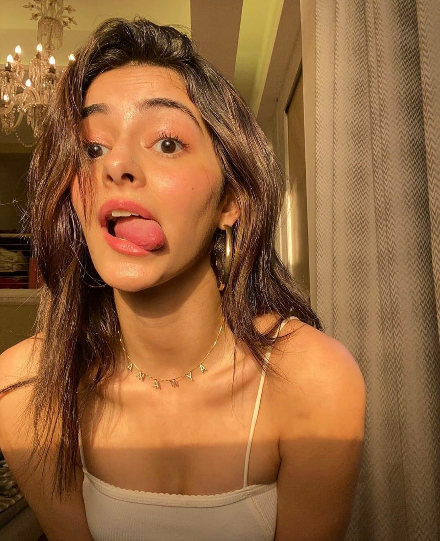 Ananya Pandey: Why is she taking her tongue out? | Scrolller