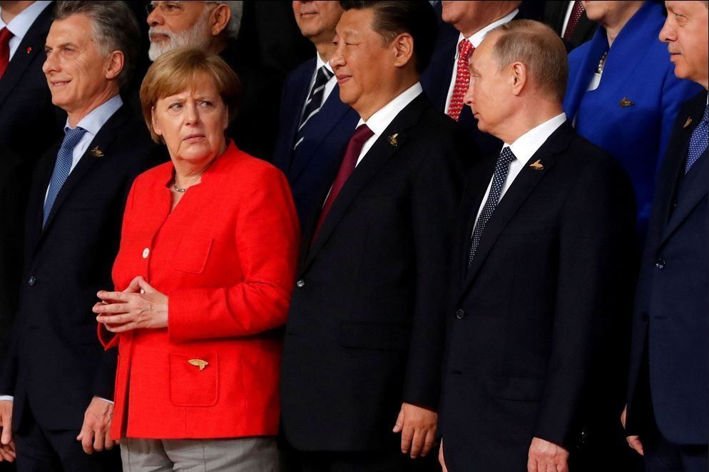 Angela Merkel, Xi Jinping and Vladimir Poutine. | Scrolller