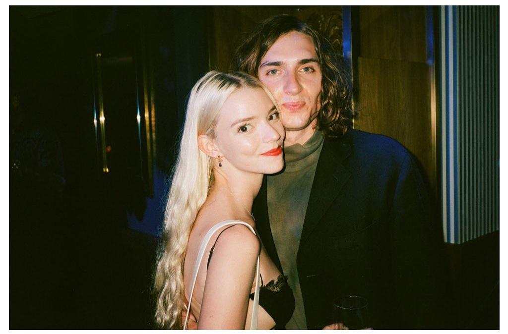 Anya at a party with her boyfriend Malcolm McRae | Scrolller