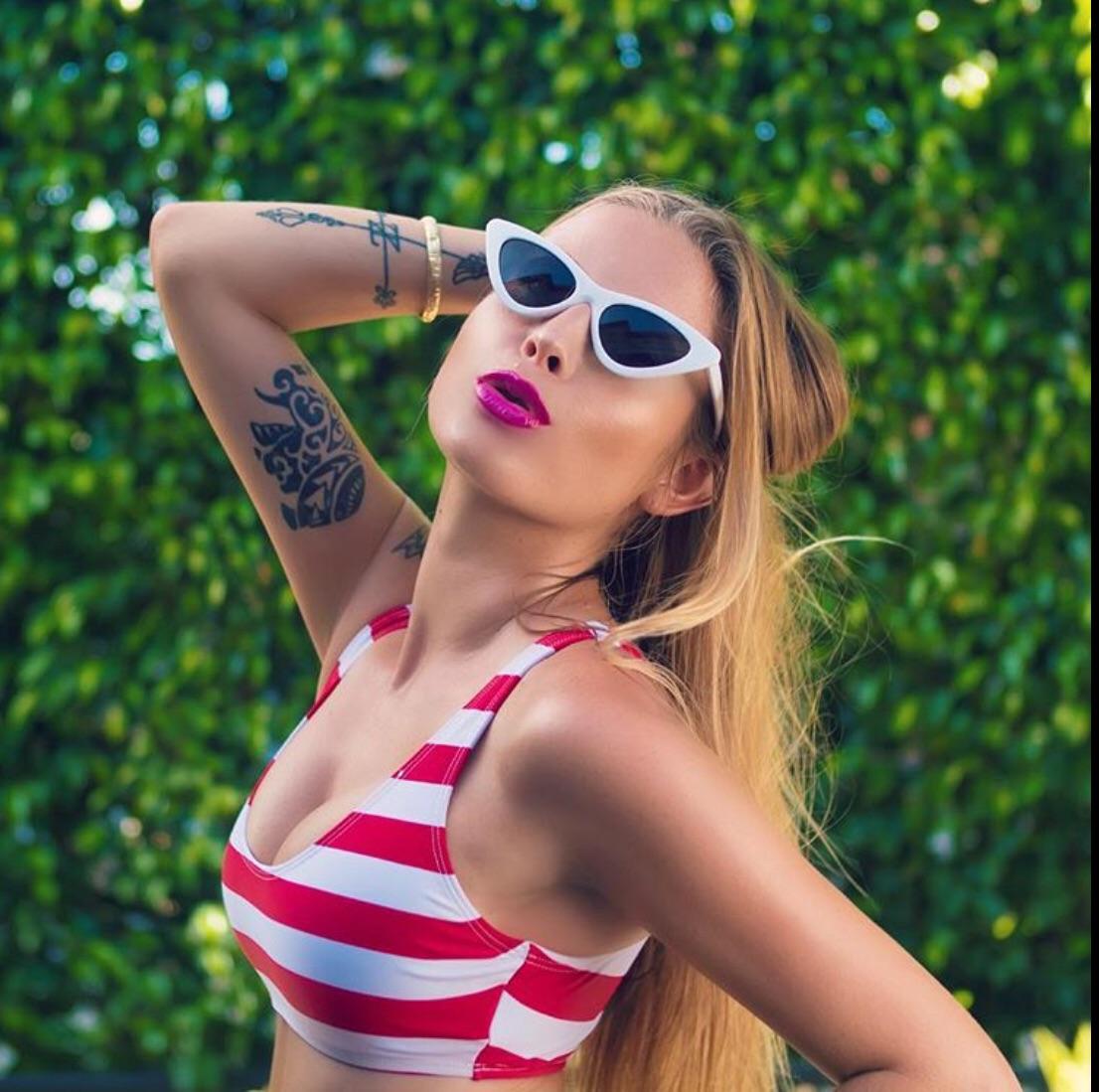 Anybody have an idea what her tattoos represent? | Scrolller