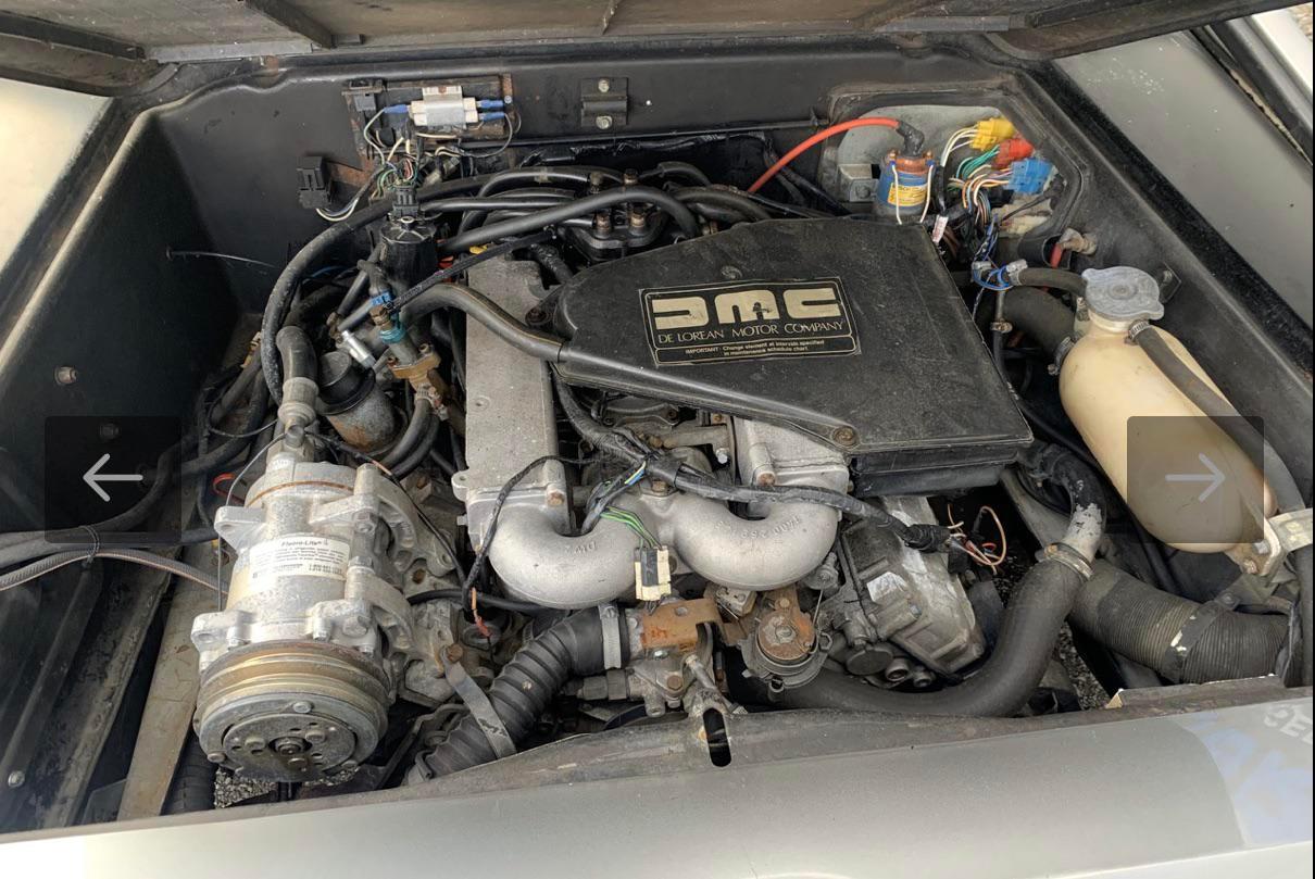 Anything look out of place in this DMCs engine bay? | Scrolller