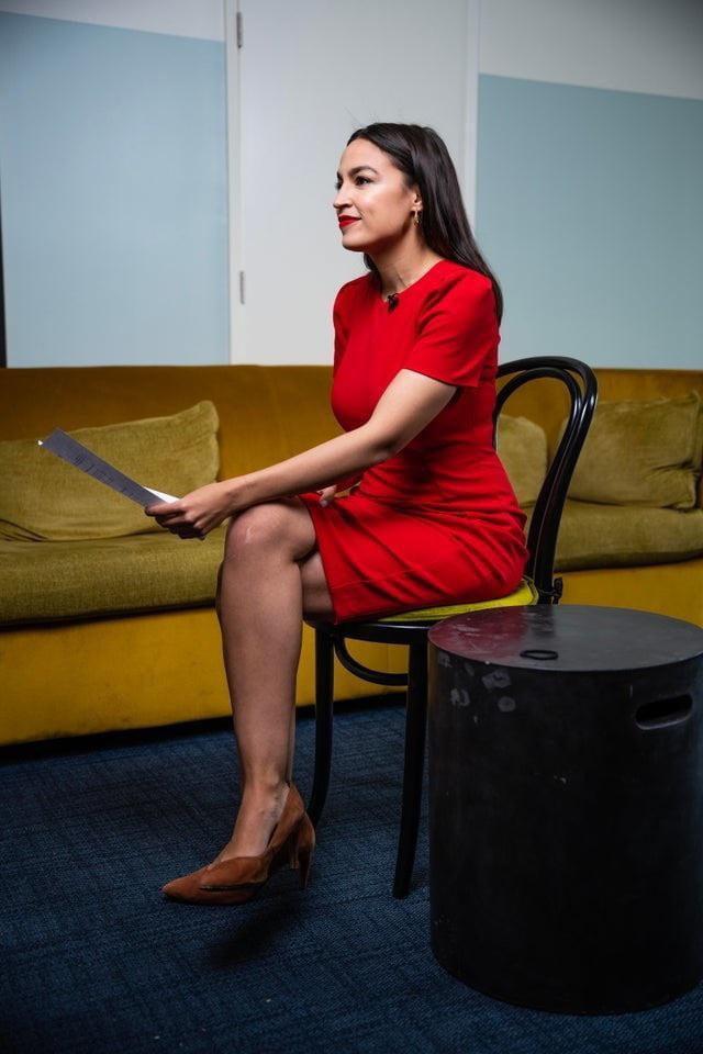 Hair back, legs crossed, chest out | Scrolller