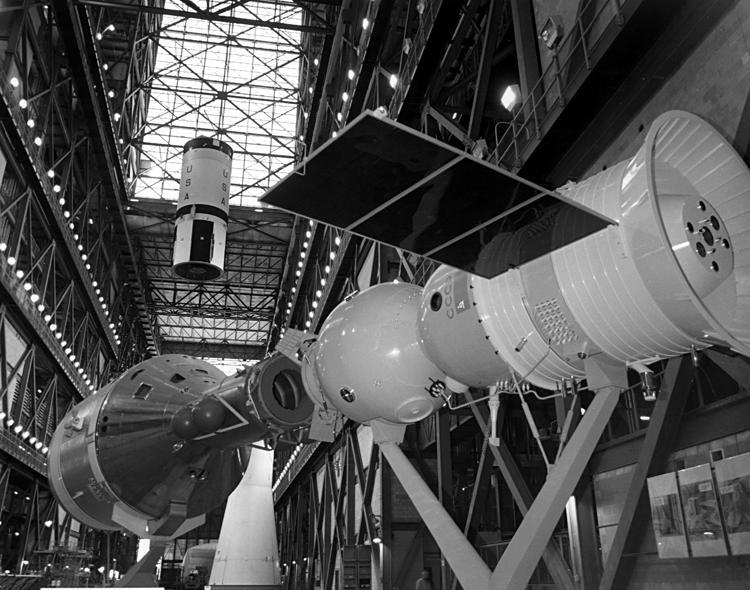 Apollo - Soyuz model in the VAB, while the ASTP vehicle is assembled in the background. | Scrolller