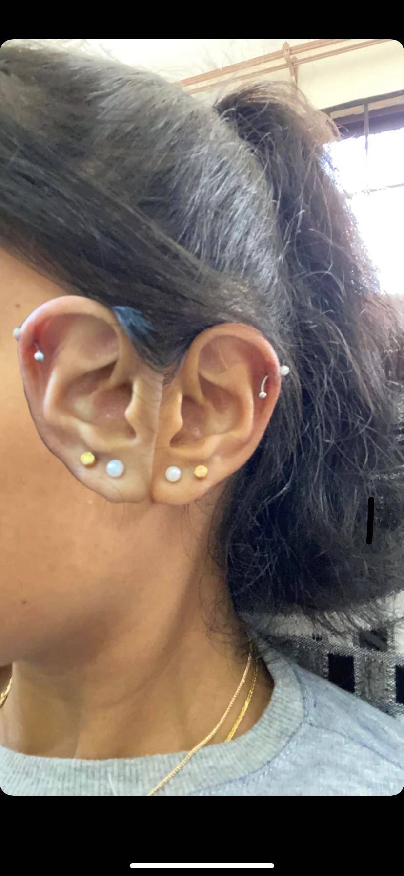 Are my second piercings uneven? | Scrolller