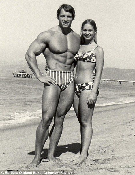 Arnold Schwarzenegger with his 1st girlfriend Barbara Outland Baker, Malibu beach - 1972 | Scrolller