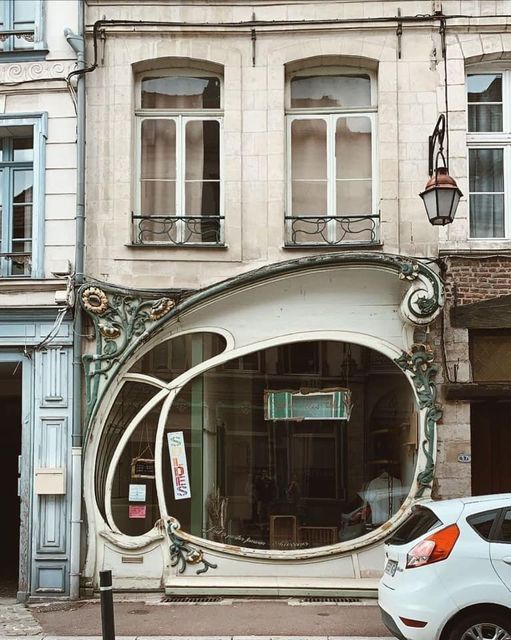 Art Nouveau storefront in Douai designed by Albert Pèpe. 1906 | Scrolller