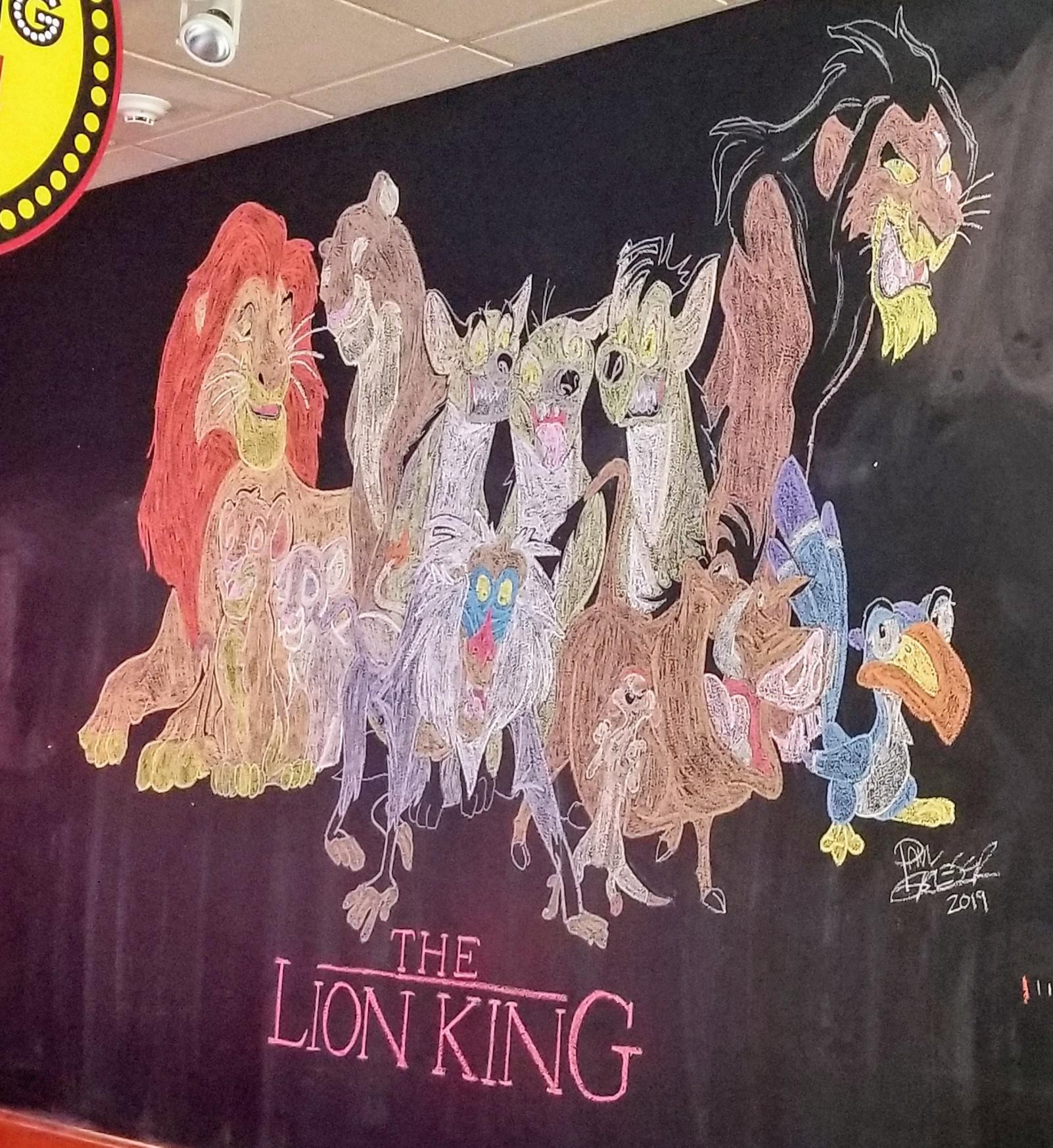 Bad picture, but here is a Lion King chalk mural I did for the restaurant I work at. Thought it ...