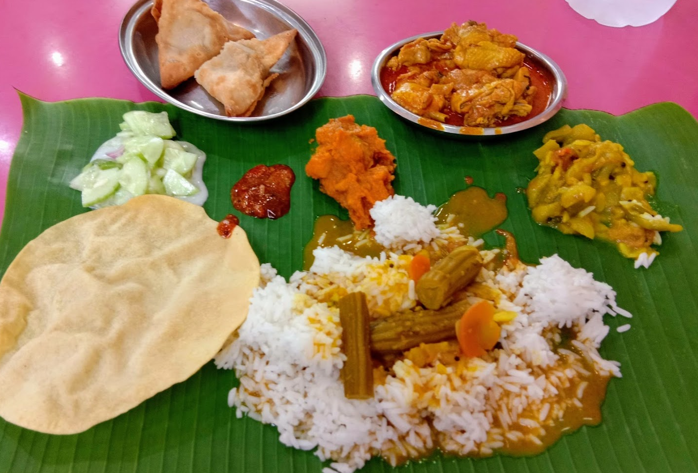 Banana leaf lunch special in Penang, Malaysia... utensils, shmeshmensils. | Scrolller