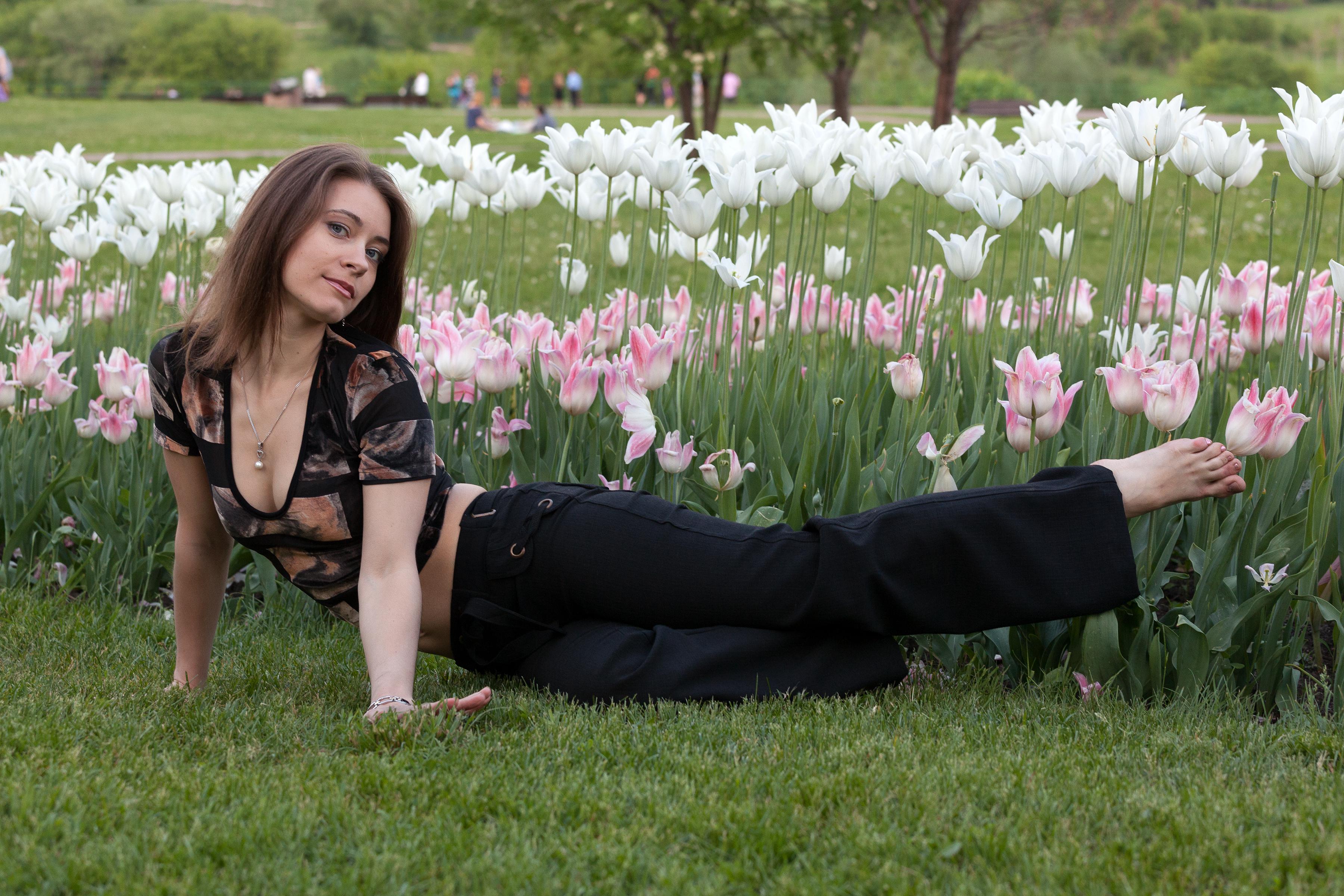 Barefoot girl among tulips | Scrolller