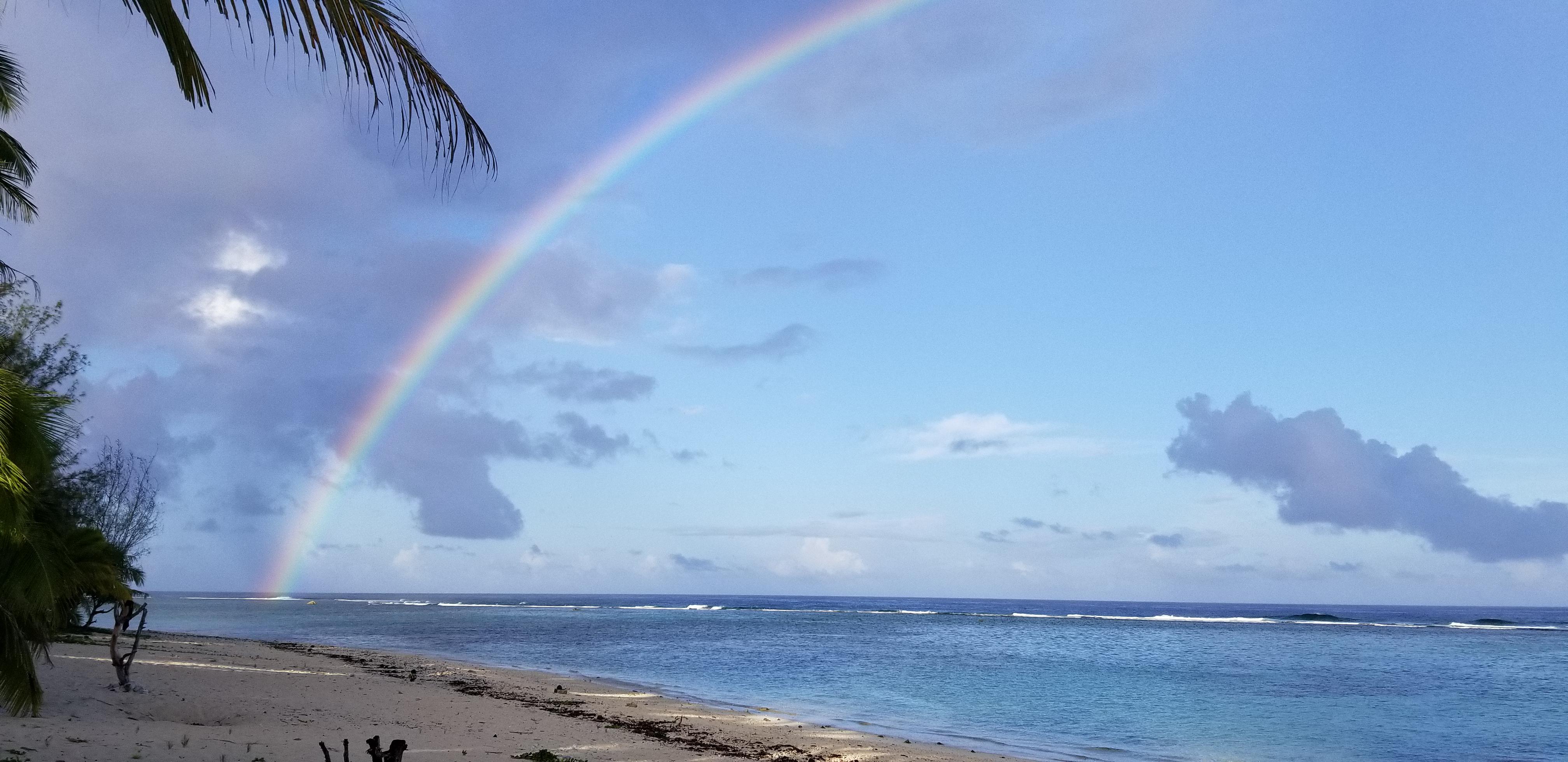 Beach rainbow. | Scrolller