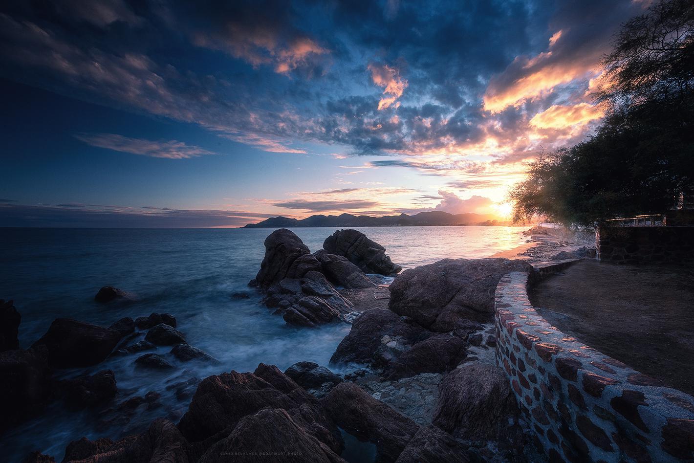 Beach, Rocks and Sunset colors | Scrolller