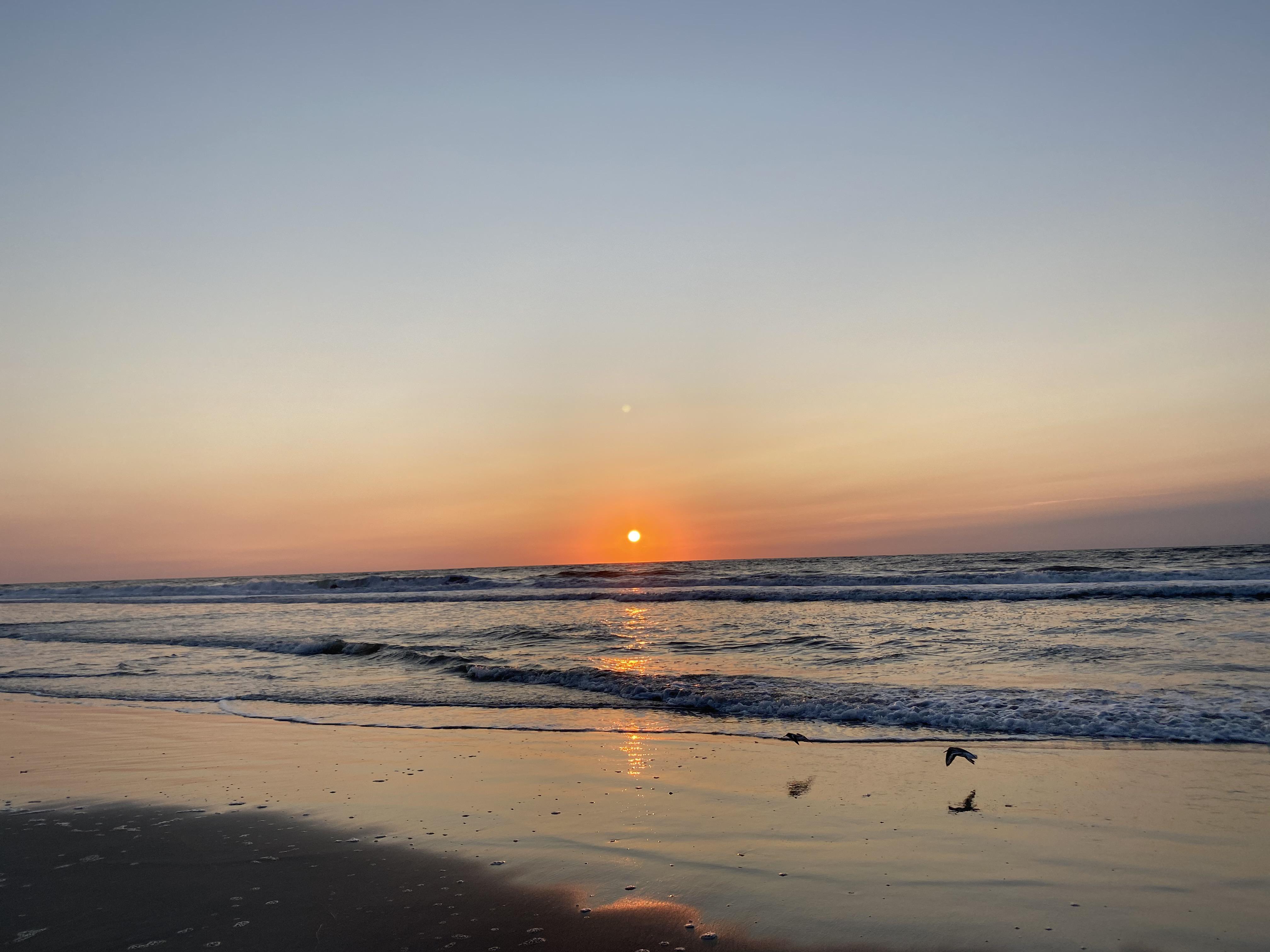 Beautiful sunrise on Chincoteague Island Beach | Scrolller