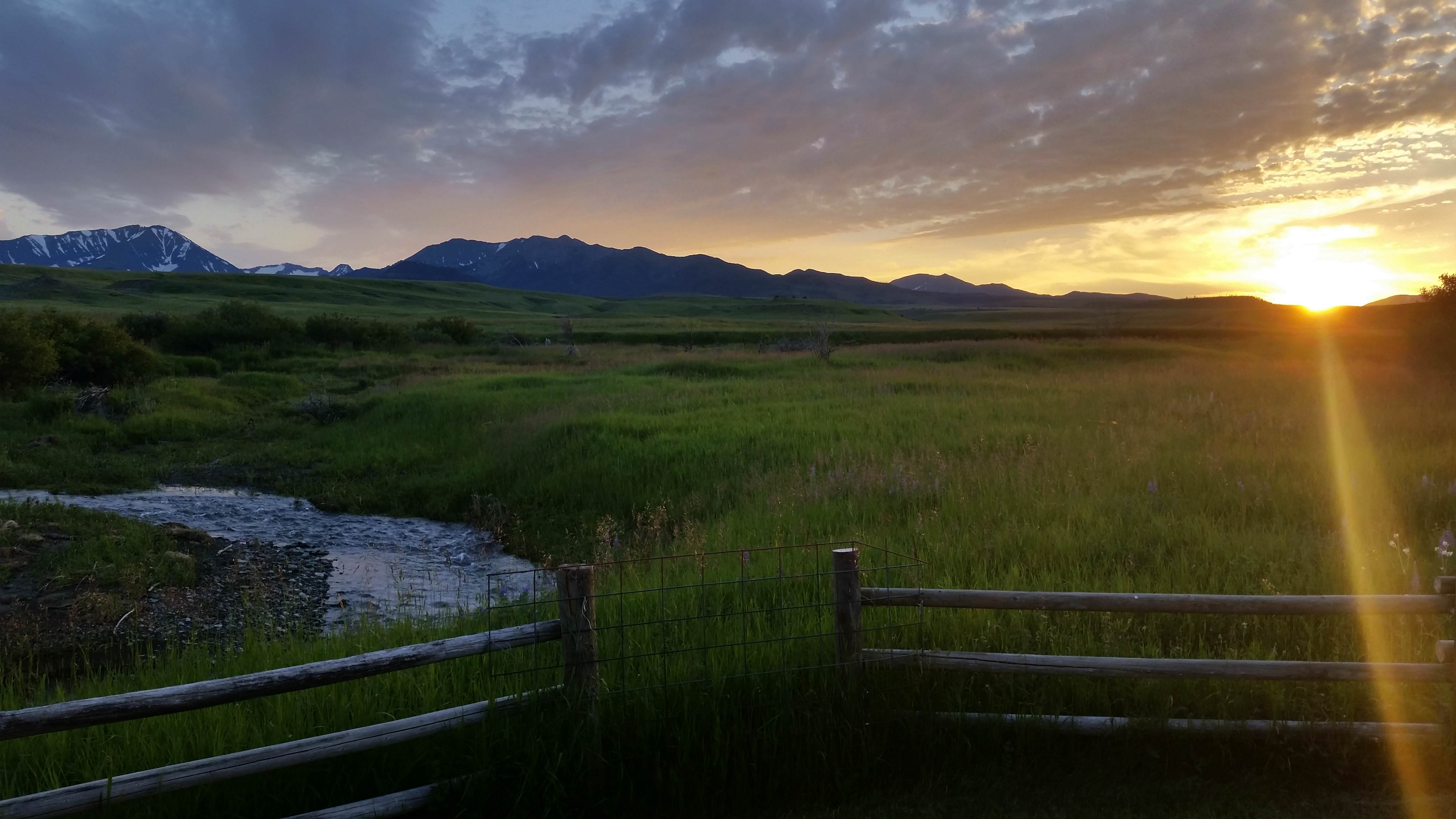 Beautiful sunset on a ranch near the Crazy Mountains. | Scrolller