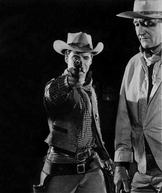 Behind the scenes. John Wayne and Ricky Nelson. | Scrolller