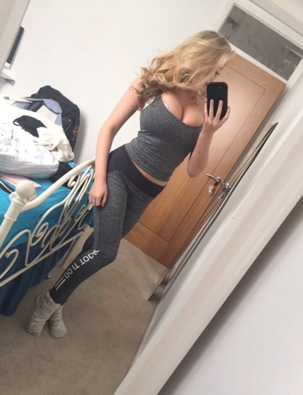 Beth Lily wearing grey | Scrolller