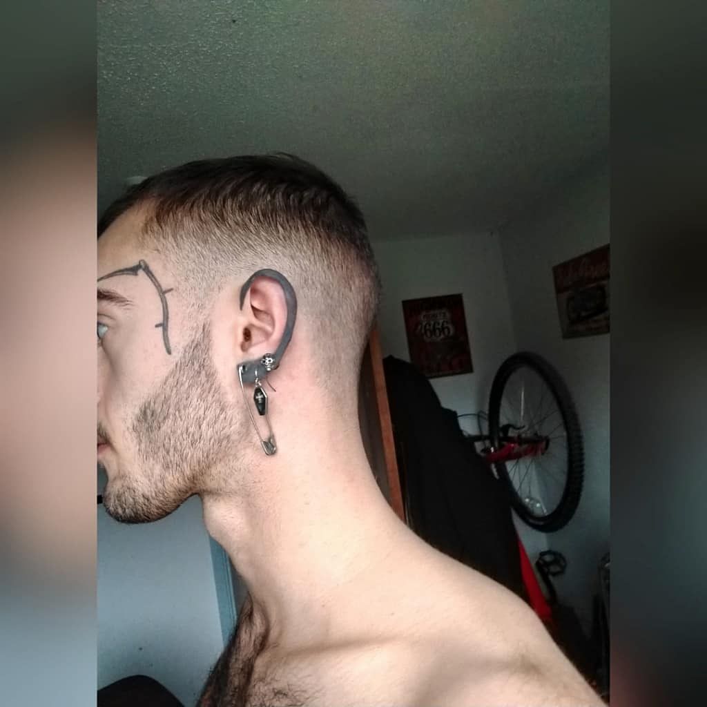 Black ear and face tattoo, ear 8 months healed | Scrolller