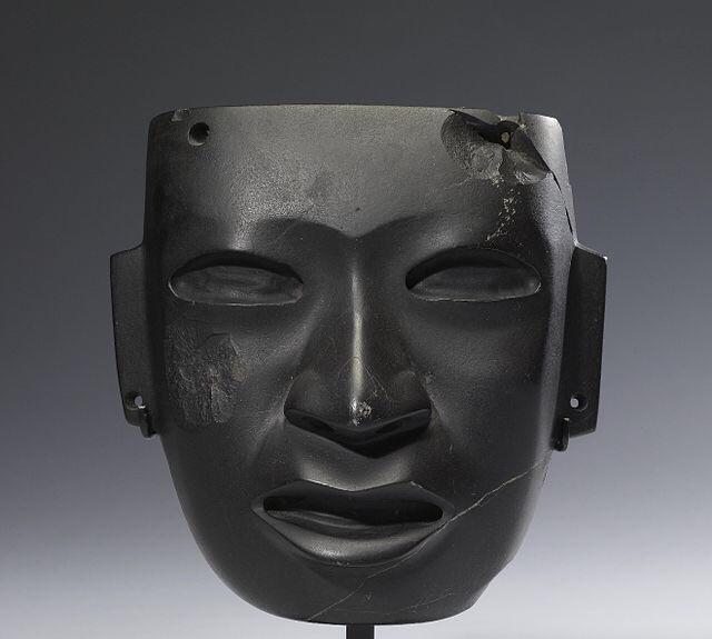 Black limestone mask | Scrolller