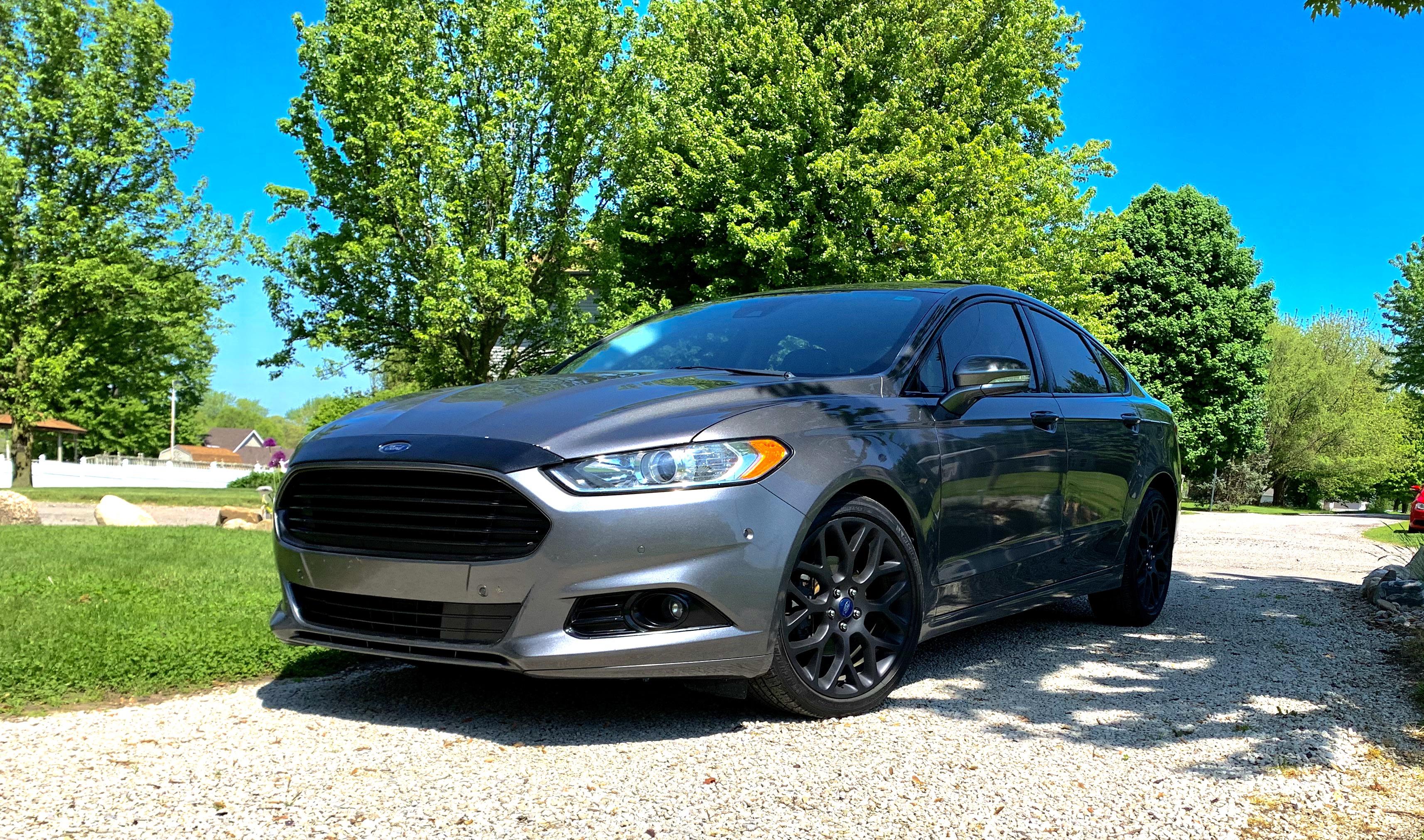 Blacked out all the chrome and wheels on my ‘13 titanium | Scrolller