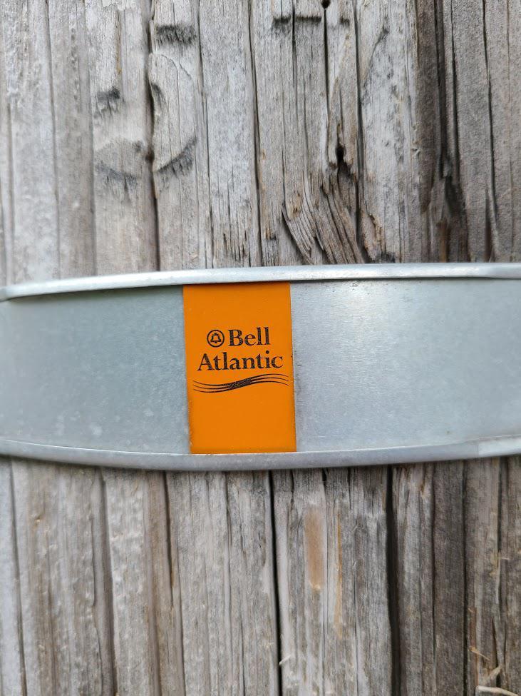 Blast from the past - telephone pole in my neck of the woods still have the old Bell Atlantic ...