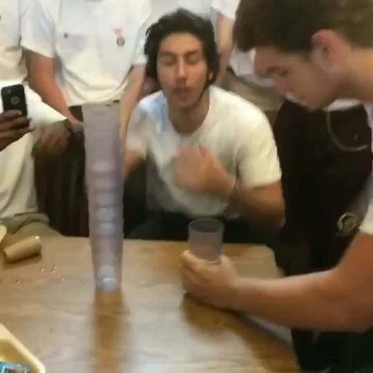 Blowing a cup onto the stack | Scrolller