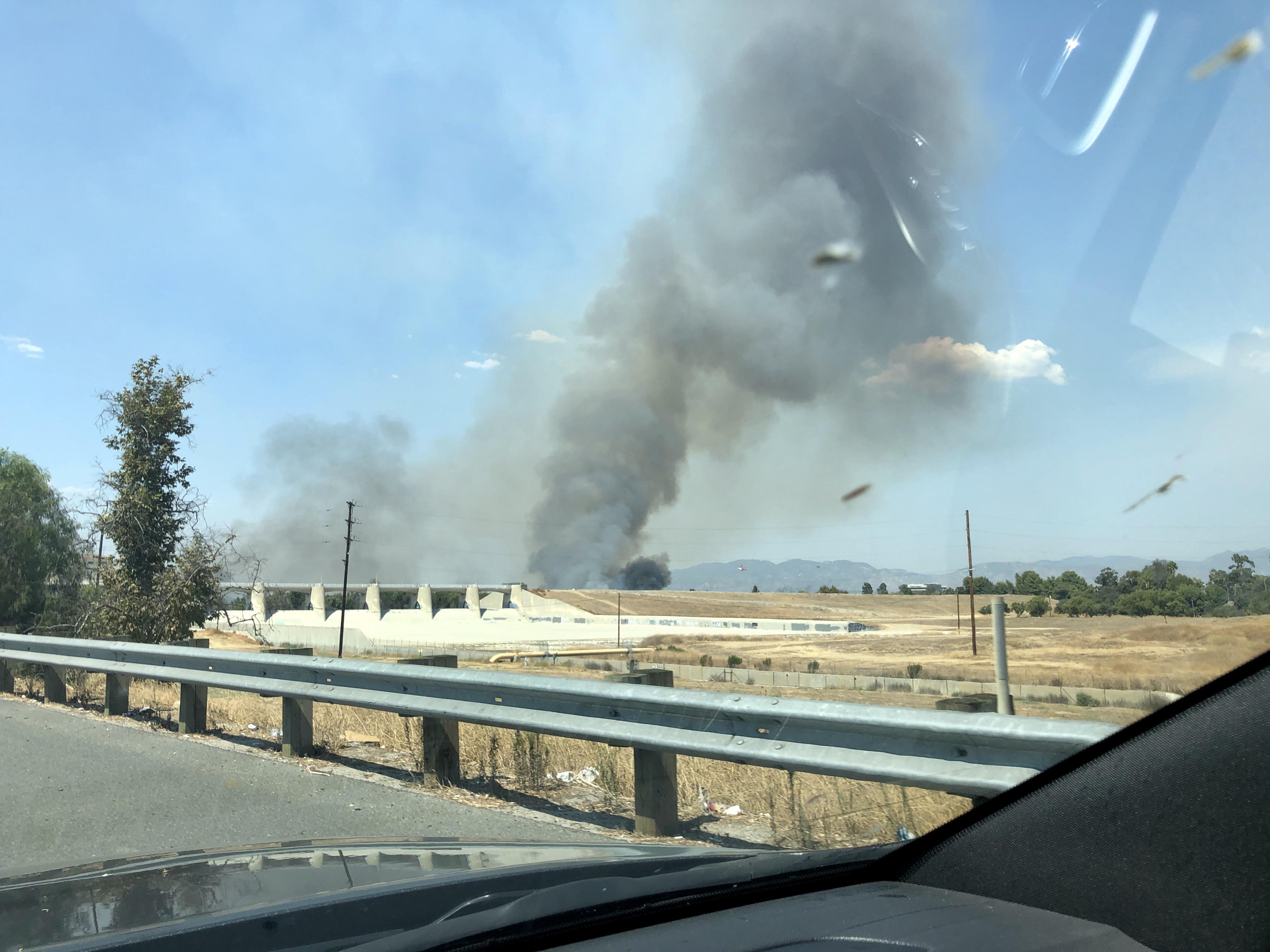Brush fire in the Sepulveda basin, near the archery range next to the 405. | Scrolller