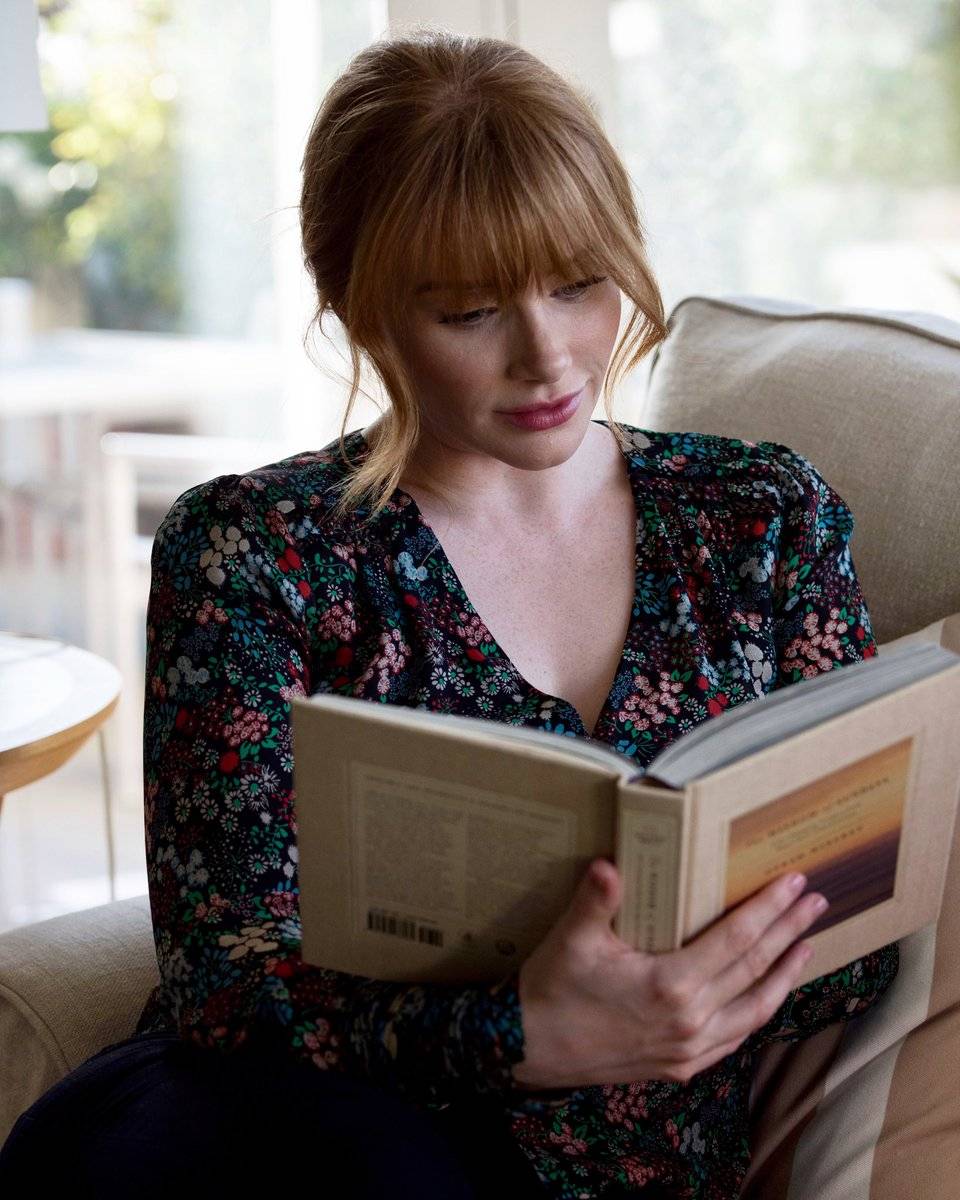 Bryce posing with a book | Scrolller