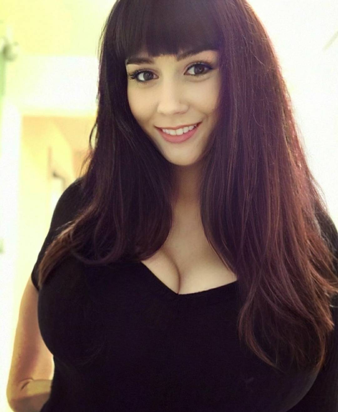 Busty stunning brunette | Scrolller