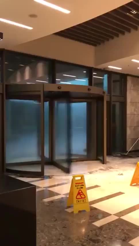 Caution wet floor. | Scrolller