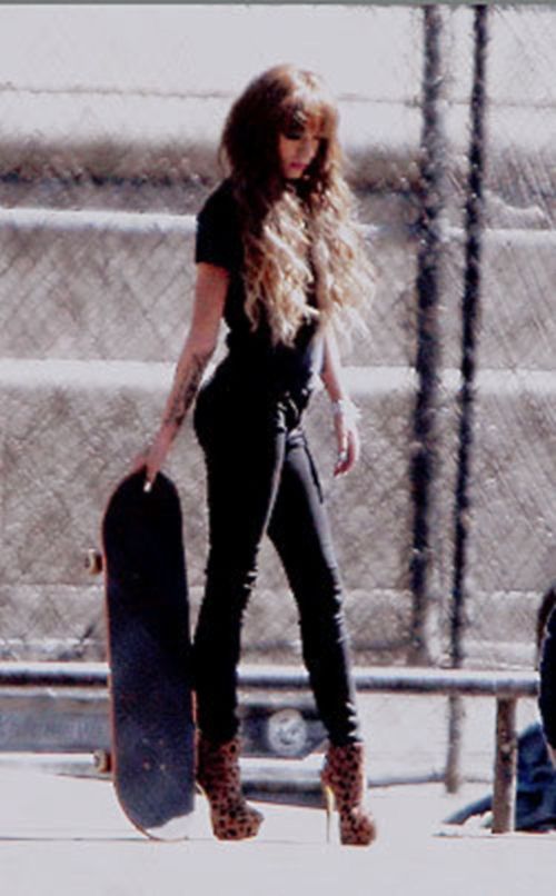 Cher with a skateboard | Scrolller