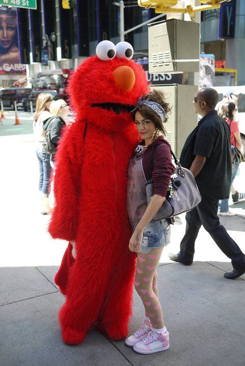 Cher with Elmo | Scrolller