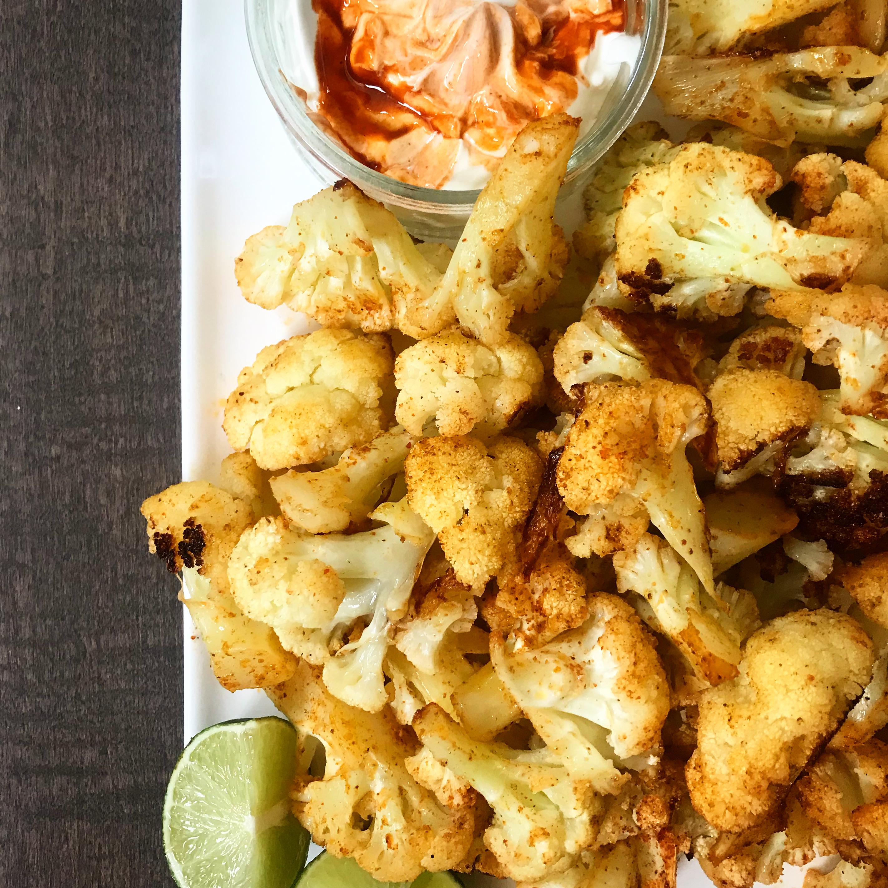 Chipotle Lime Roasted Cauliflower with Spicy Sour Cream | Scrolller
