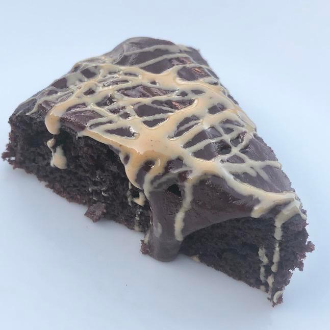 Chocolate cake with chocolate ganache and peanut butter drizzle | Scrolller