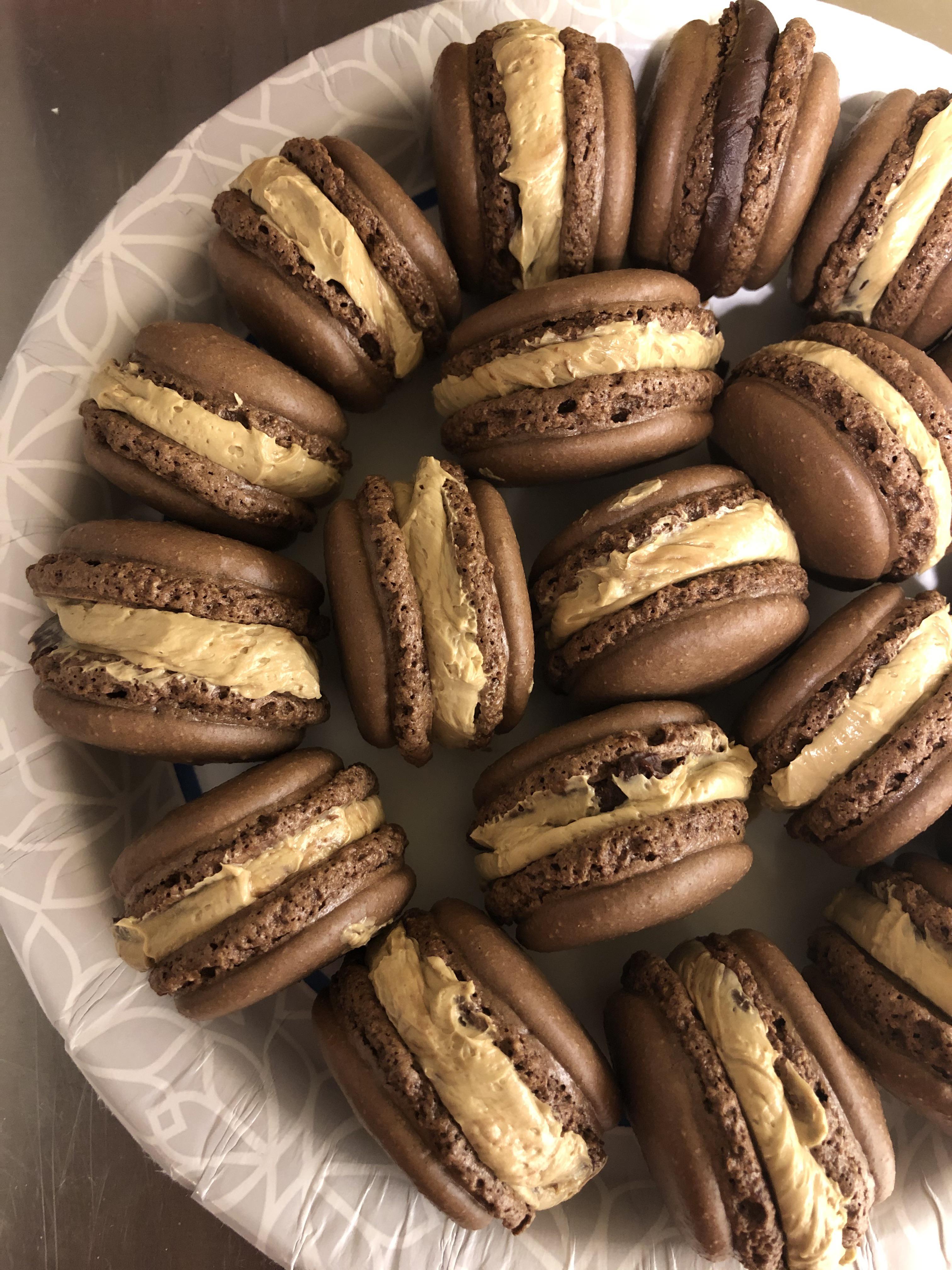 Chocolate macarons with coffee Swiss buttercream and dark chocolate ganache | Scrolller