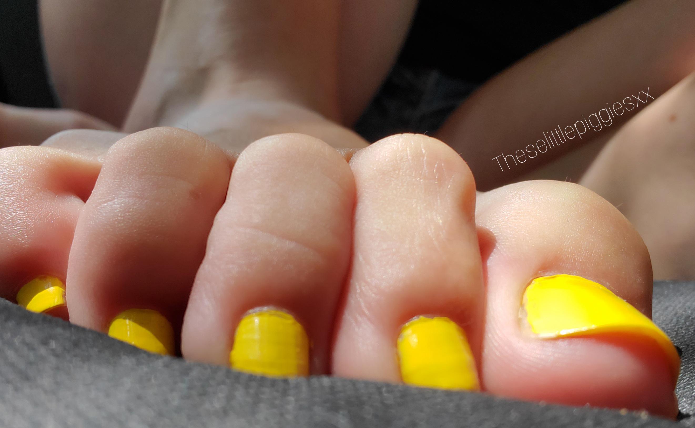 Close up toe curl in yellow polish! 💛 | Scrolller