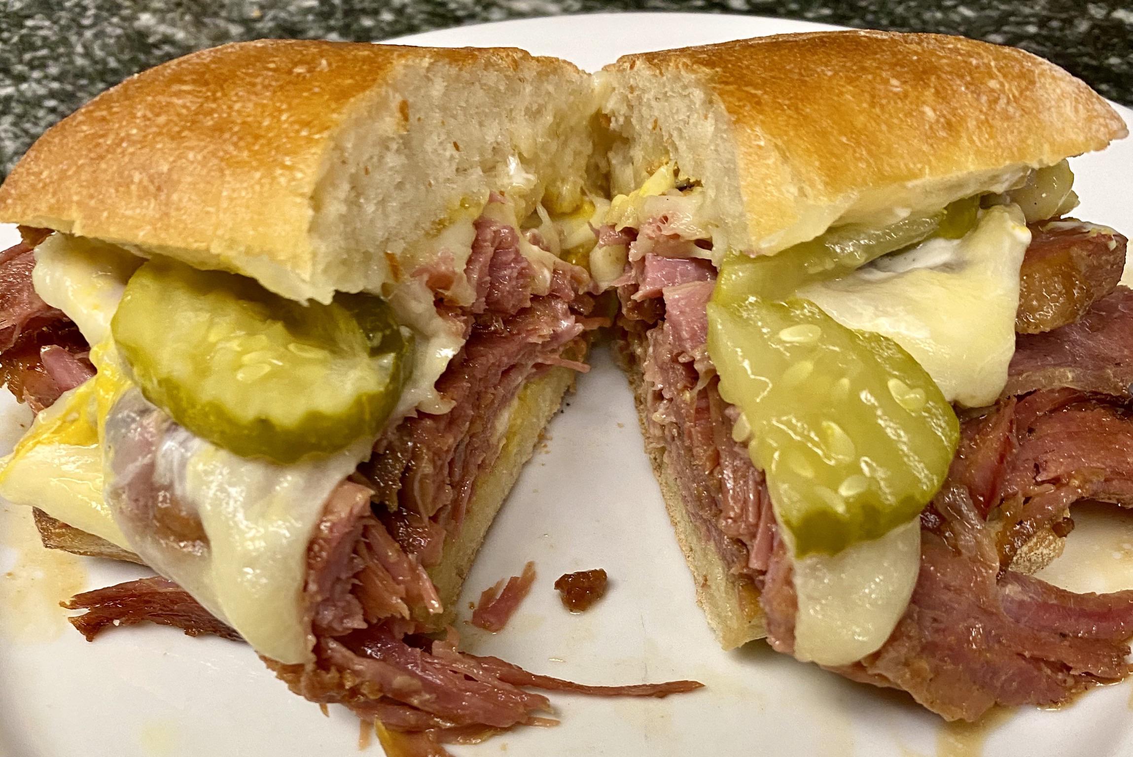 Corned beef brisket with melty Swiss on toasted ciabatta | Scrolller