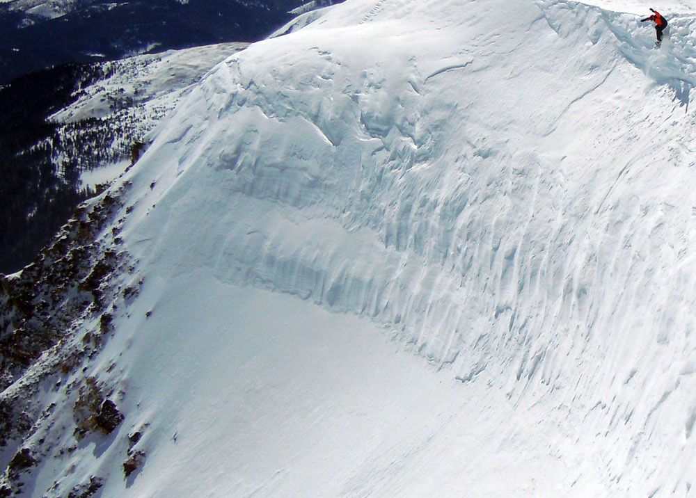 Cornice drop to 70ft/20m cliff face | Scrolller