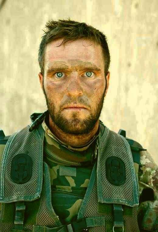 Corporal Antonio Mettrucio after a 72-hour long fire-fight. The stare of a broken man. | Scrolller