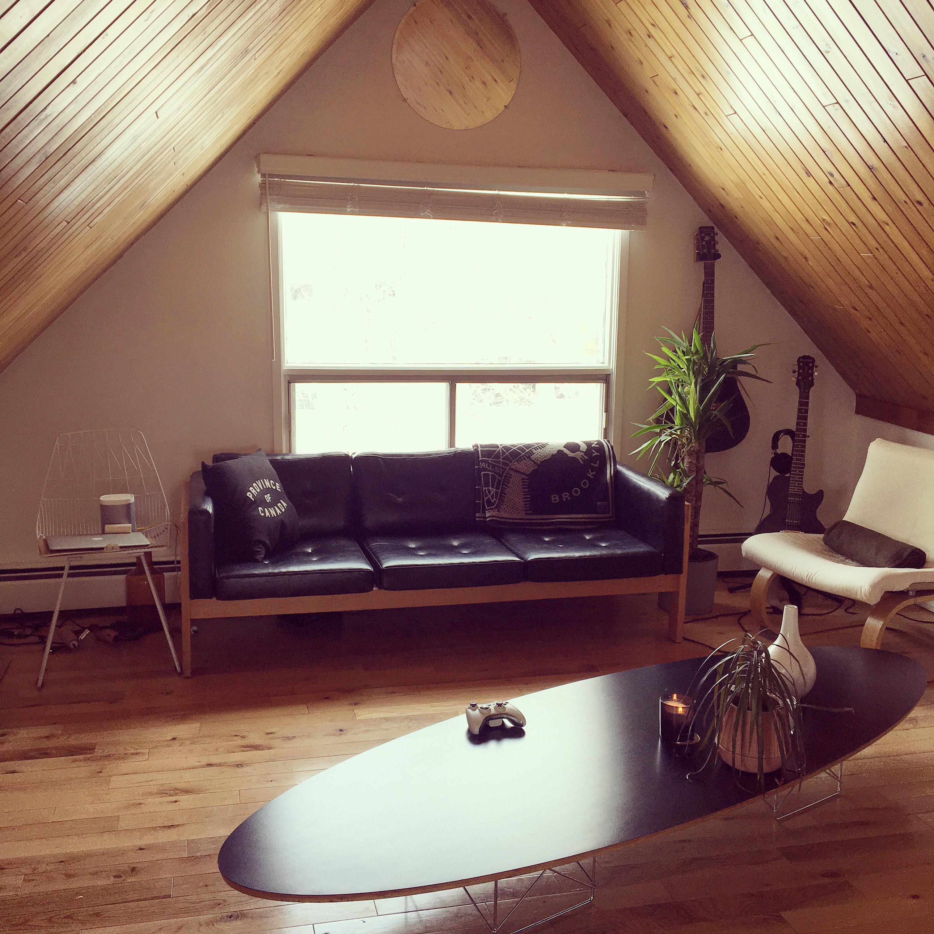 Cozy cabin style A-frame living room - Canada | Scrolller