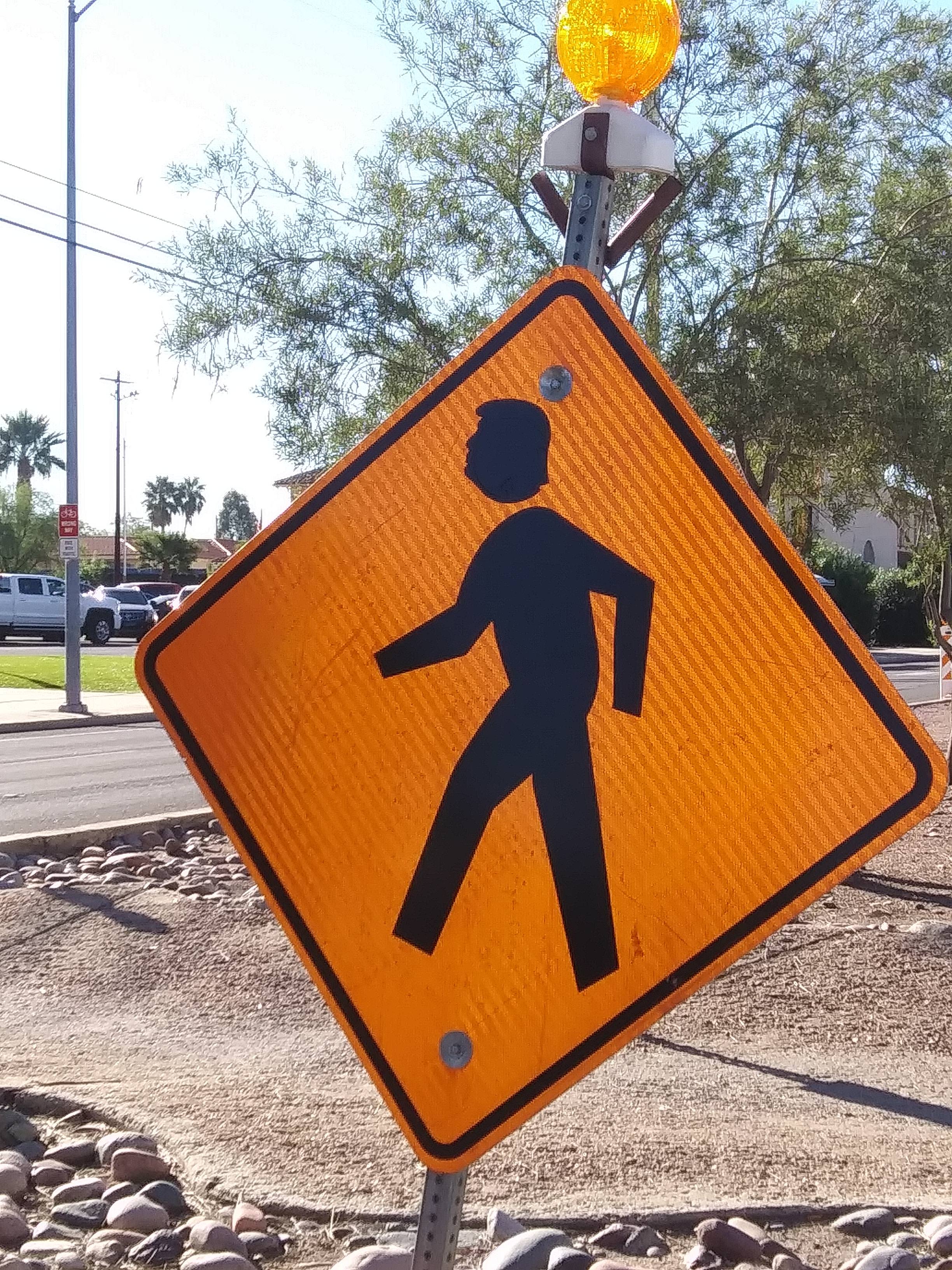 Crosswalk sign on Campbell | Scrolller