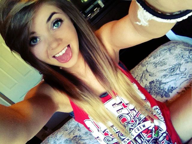 Danni-Meow sticks her tongue out | Scrolller