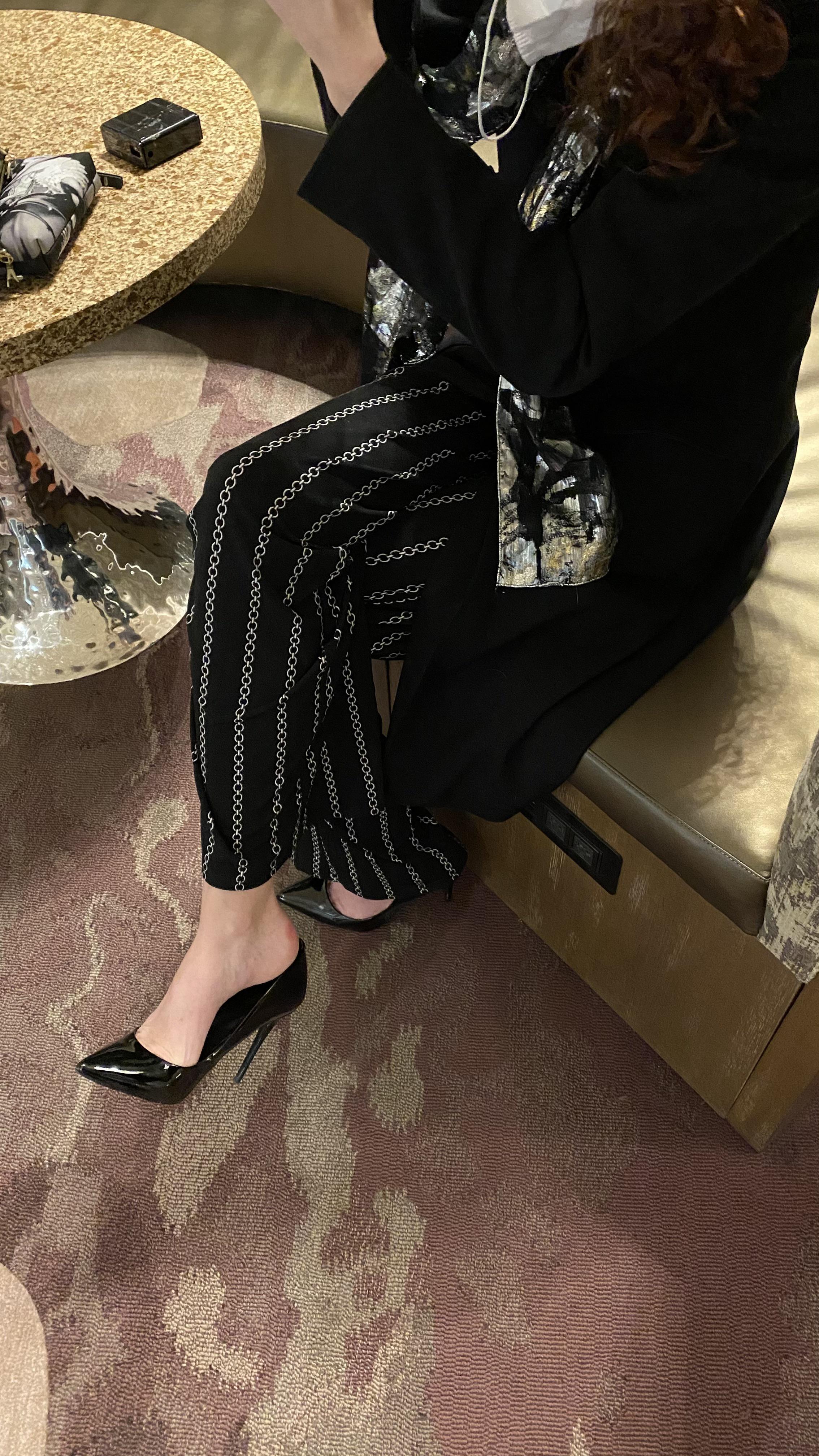 Date night with wife. Dangling that barefoot in the high heels always drives me crazy. | Scrolller