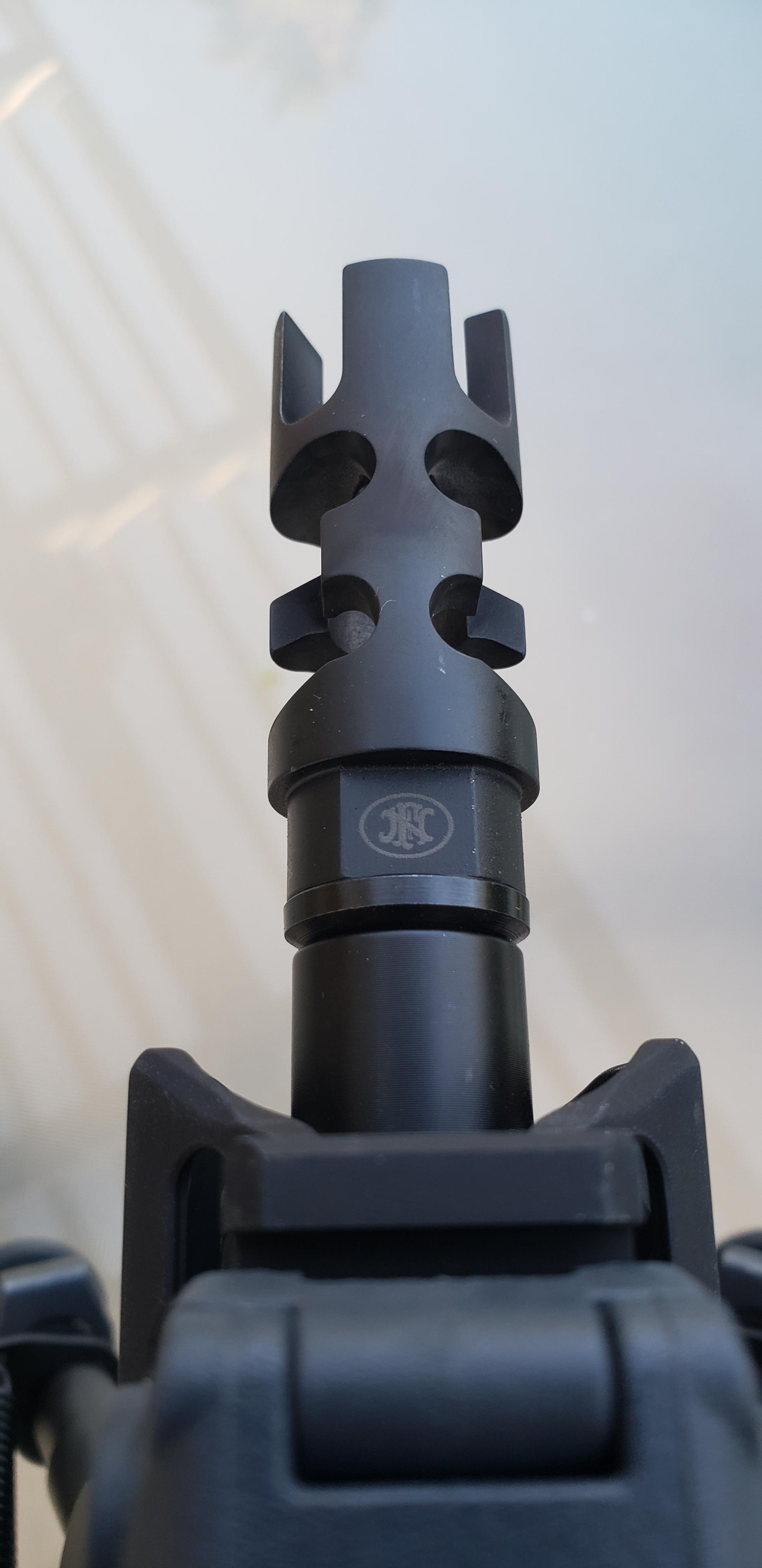 Does anyone know what brand muzzle break this is? | Scrolller